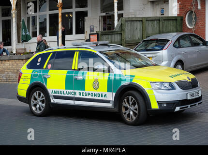 Ambulance fast response car with blue lights flashing on way to ...