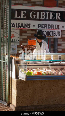 A cheese stall in Marche des Enfants Rouges, the oldest market in Paris ...