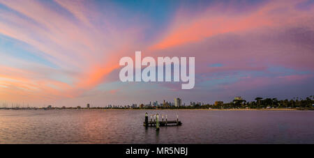 Melbourne skyline and skyscrapers with a pink and purple sunset in the ...