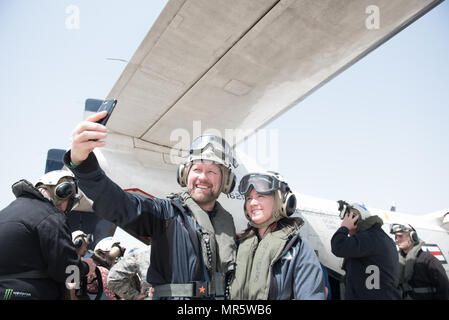 Craig Morgan and wife Karen Greer arrive on the red carpet for the USO ...