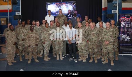 Lt. Col. Stanley Reed, RCC-SWA Director, holding the award for the ...