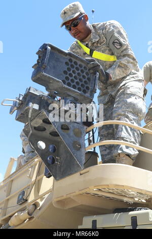 An Abrams tank with 2d Battalion, 198th Armored Regiment, fires a 120 ...