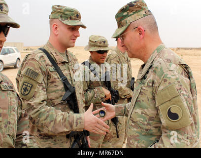Task Force Spartan Deputy Commander, Brigadier General John M. Epperly ...