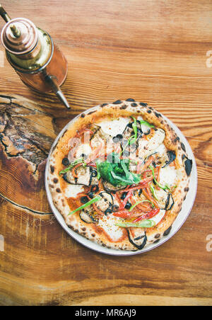 Rustic vegetarian pizza. Freshly baked oval pizza with vegetables ...