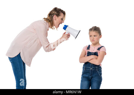 Angry mother shouting at her daughter isolated on white background ...