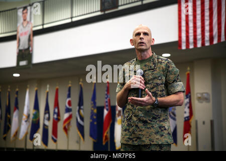 Brig. Gen. Kevin M. Iiams took the command battle colors from Sgt. Maj. James N. Calbough ...