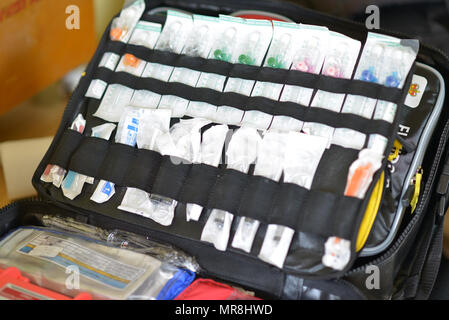 Paramedic's drug administration pack of catheters, needles and syringes ...