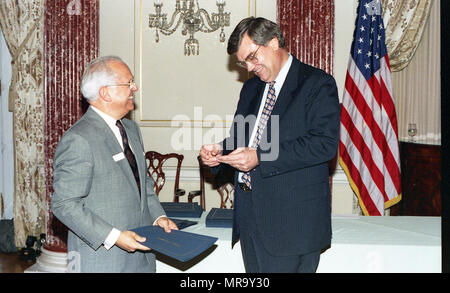 man accepting award taking a picture Stock Photo - Alamy