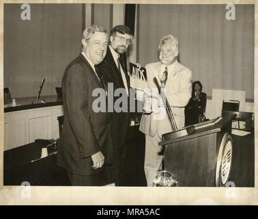 USAID REPORT TO CONGRESS - USAID members displaying AIDS book from ...
