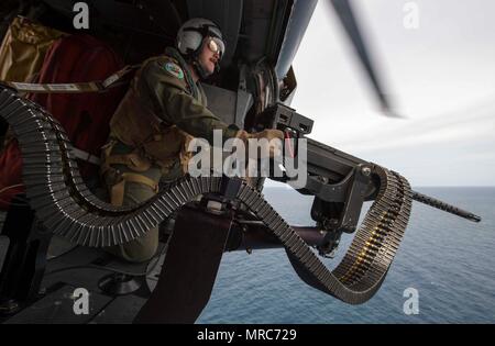 170603-N-PD309-946 GULF OF THAILAND (June 3, 2017) Naval Aircrewman ...