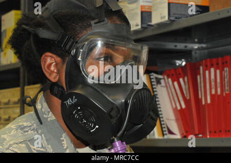 Airman Keyonna Davis, 916th Maintenance Squadron, gets fitted for her ...