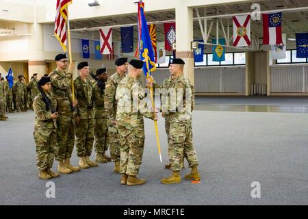Col. Jeffrey A. Becker, commander, 3rd Combat Aviation Brigade hands ...