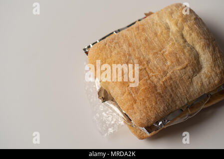 Fresh tasty panini sandwich with plastic waste and paper cardboard ...