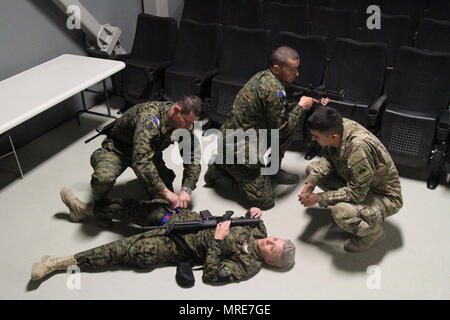 applying a tourniquet by 1st Armored Division and Fort Bliss Stock ...