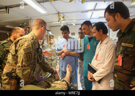 A U.S. Army trauma surgeon with 2nd Forward Surgical Team, U.S. Forces ...