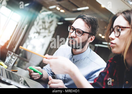 Open laptop on the table. Blurred laptop screen while working. Device ...
