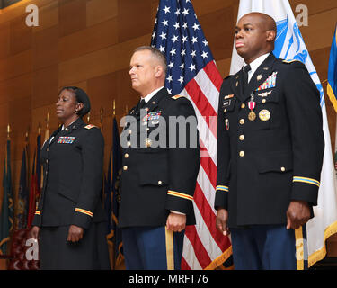 From right, Lt. Col. Laura Wood, Joint Personal Effects Depot officer ...