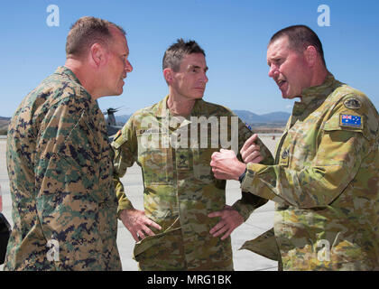 Australian Army Warrant Officer Don Spinks speaks with members of the ...