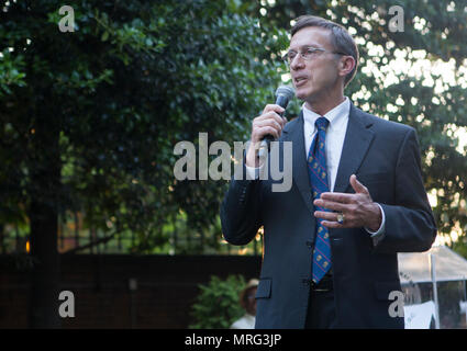 Secretary of the Navy the Honorable Sean J. Stackley, left, speaks to ...