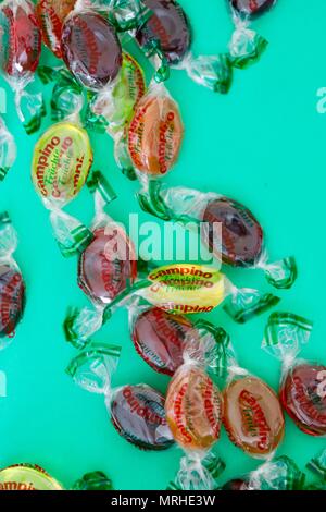 Campino boiled fruit flavoured sweets on a turquoise background Stock ...