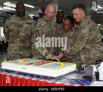 Command Sgt. Maj. Scott Anderson (second from left), U.S. Area Support ...