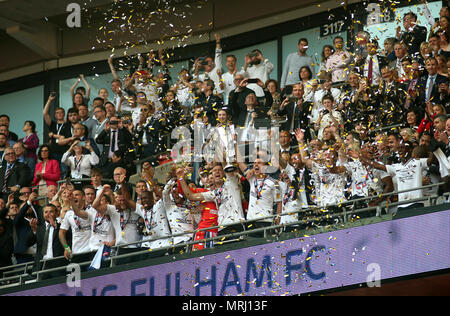 Fulham players celebrate with the Championship trophy after being ...