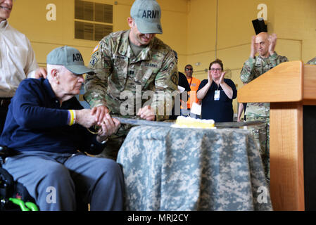 Maj. Gen. Kirk Vollmecke, left, the Program Executive Officer for ...