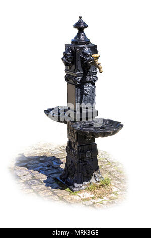 Pulpulak covered with black paint. Copper water tap. Isolated image on ...