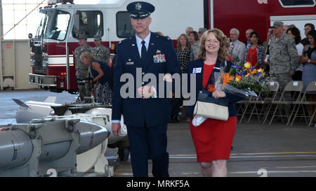 Col Richard W. Gibbs, 377th Air Base Wing commander, escorts his wife ...