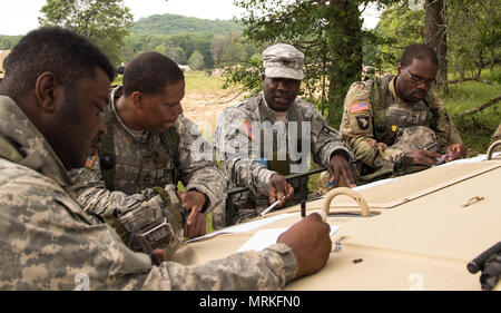 Soldiers with the 2nd Battalion, 122nd Field Artillery Regiment, 33rd ...