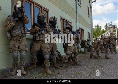 U.S. Army Soldiers from the 51st Military Police Battalion conduct ...