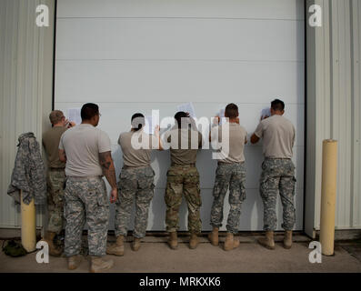 Sign MP (military police) on soldiers arm Stock Photo - Alamy