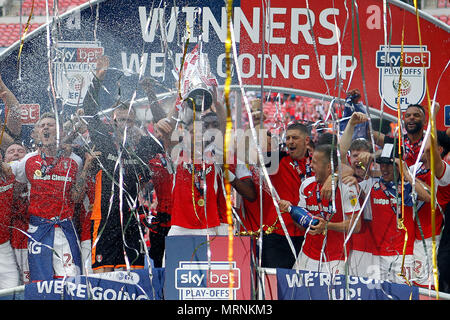 Rotherham United players celebrate on the winners podium with the ...