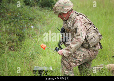 U.S. Army Sgt. Robert Prashaw, assigned to 705th EOD Company, 63rd EOD ...