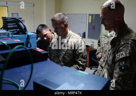 Senior Airman Joseph, 380th Expeditionary Communication Squadron radio ...