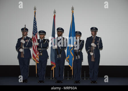 Andersen Air Force Base's Honor Guard presents the colors during the ...
