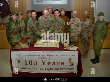 Lt. Col. Marc R. Welde, president, Silver Caduceus Society (left), Brig ...