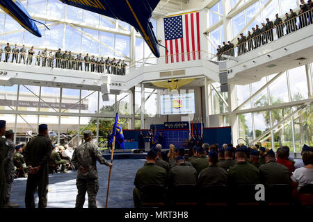 Members of the 479th Flying Training Group look on during a change of command ceremony June 30 ...