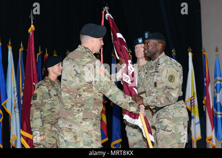 Brigadier General R. Scott Dingle hands the flag to in-coming Colonel ...