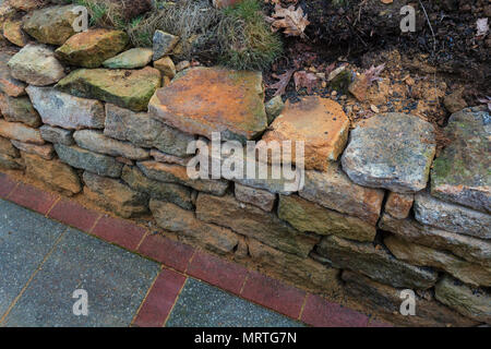 Detail of hand laid rock wall, dry wall construction technique Stock ...