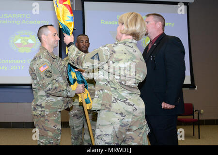 Incoming RTA Commandant LTC Matthew Metzel speaks to the audience ...