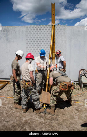 Soldiers with the 1049th Firefighting Detachment (FFTD) install the ...
