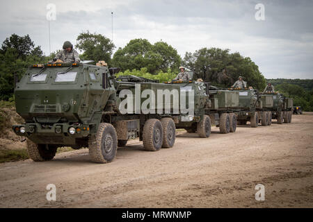 Crews from the 4th Battalion of the 133rd Field Artillery Regiment ...