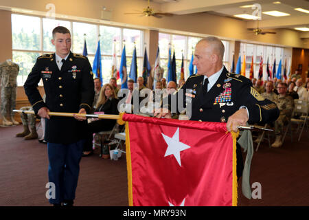 Command Sgt. Maj. Michael Ferrusi (center), U.S. Army Alaska command ...