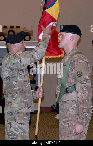 Command Sgt. Maj. Miguel Quiros, center, from the 4th Battlefield ...