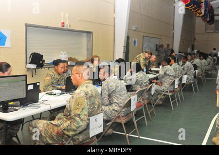 Soldiers from the Virgin Islands National Guard clear the Melvin Evans ...