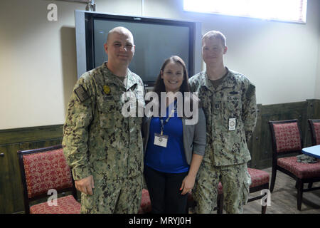 Chief Master-at-Arms Matthew Littrel, Sarah Morales and Lt. Thomas ...