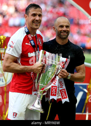 Rotherham United's Richard Wood (left) celebrates with team-mates ...