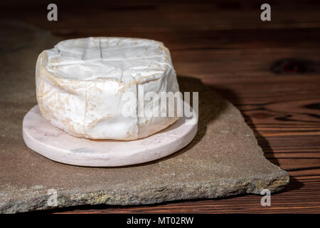 white cheese with mold on stones texture, close up, Italian, French ...