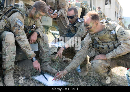 U.S. Army Cpt. Mark Buhl, left, commander, Company B, 1st Battalion ...